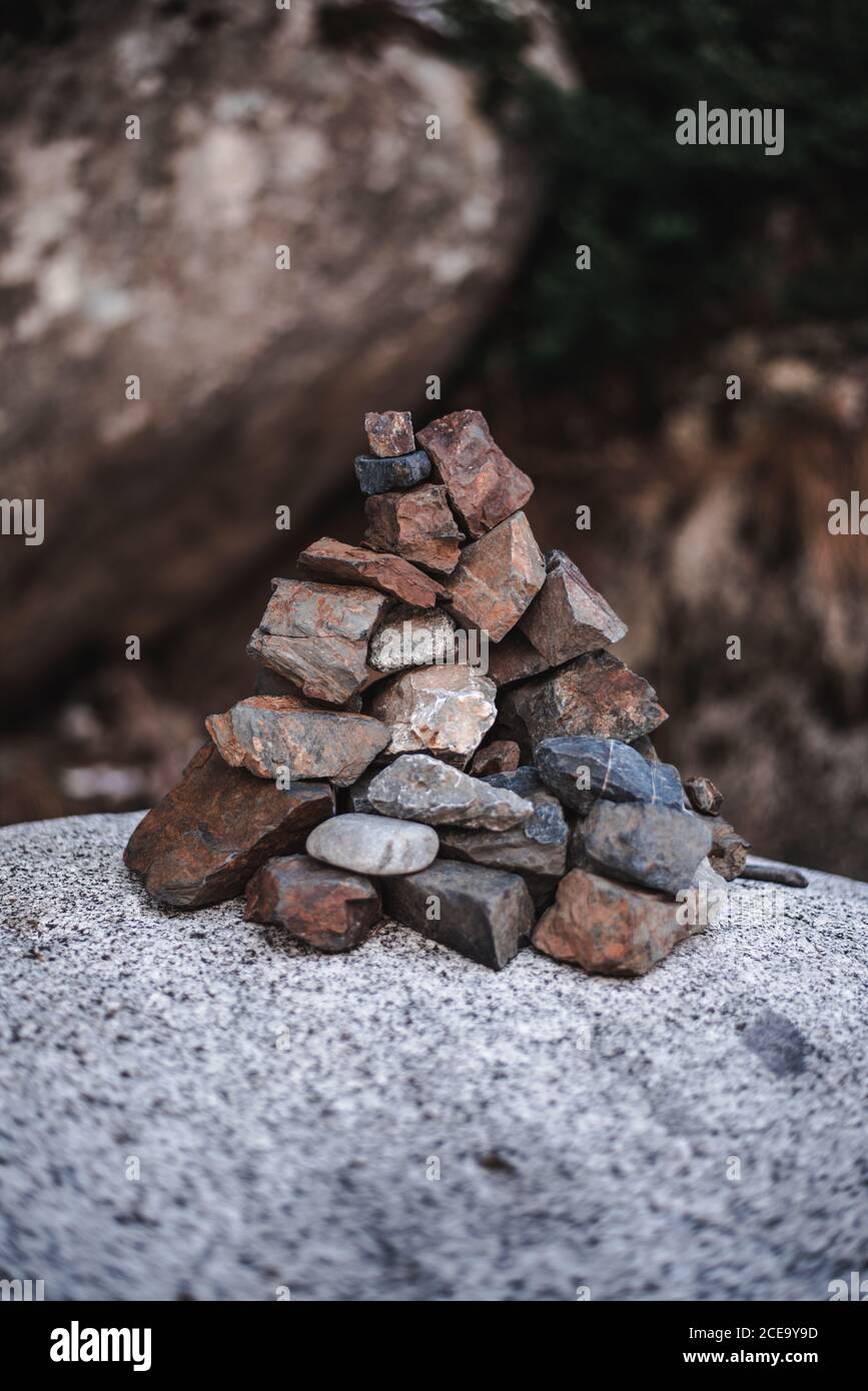 Pile of small stones on rock Stock Photo - Alamy