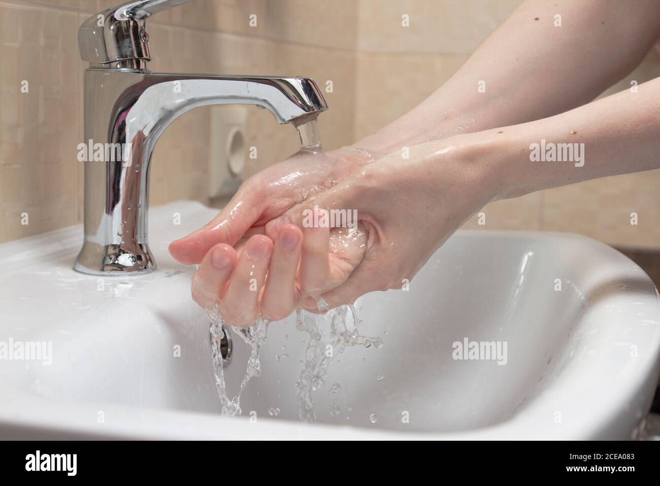 Hygiene. Cleaning Hands. Washing hands with clean water. Woman's hand ...