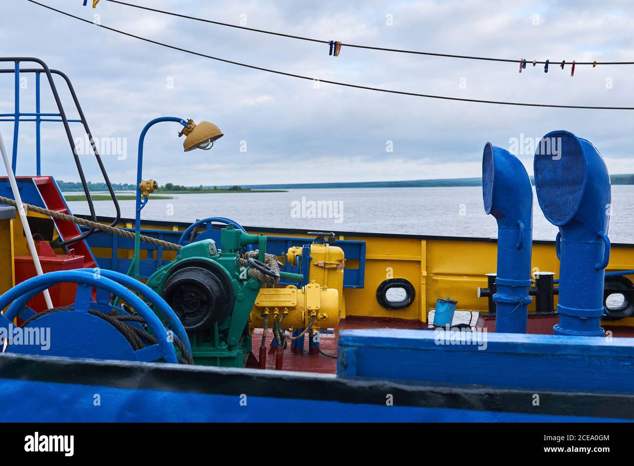 forecastle of a small river tugboat with the necessary mechanisms ...