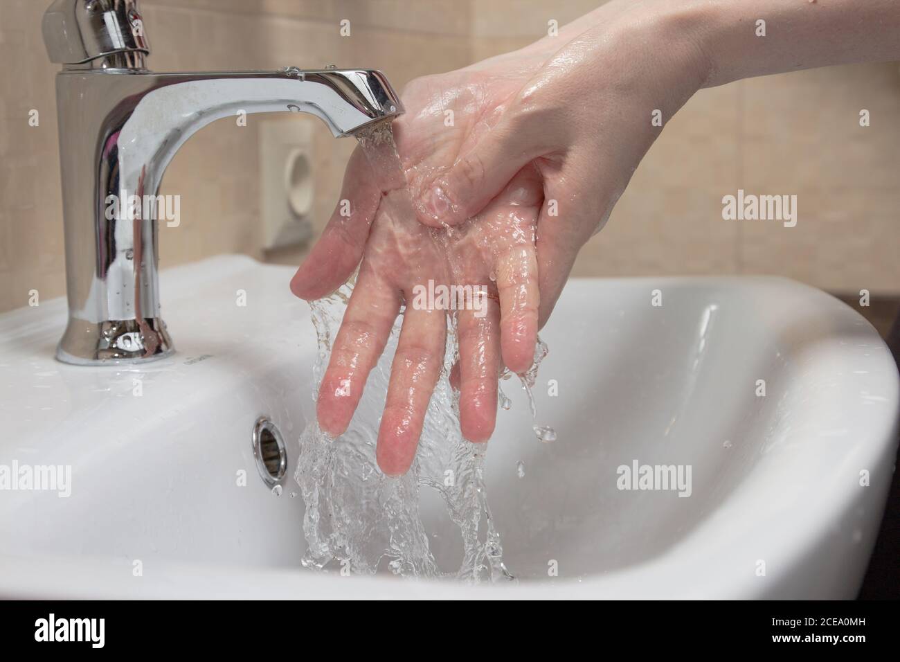 Hygiene. Cleaning Hands. Washing hands with clean water. Woman's hand ...