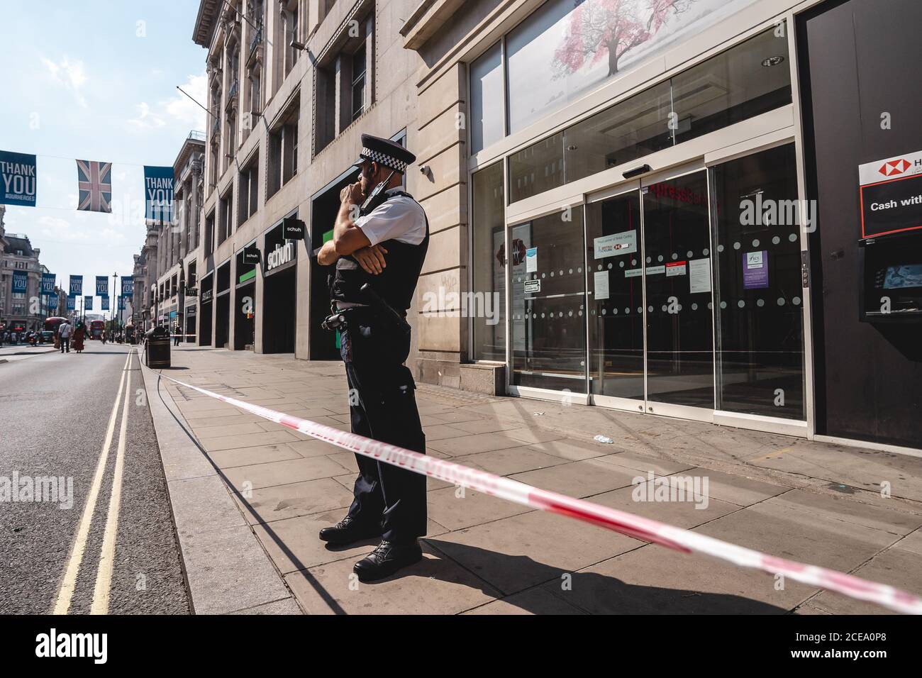 London / UK - 08/09/2020: Police officers securing the perimeter after ...