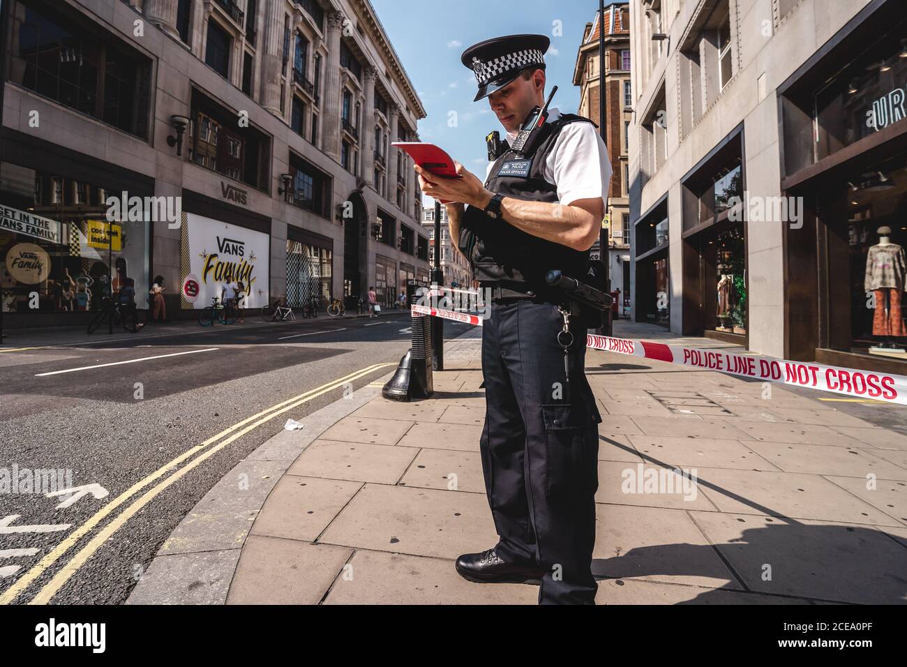 London / UK - 08/09/2020: Police officers securing the perimeter after ...