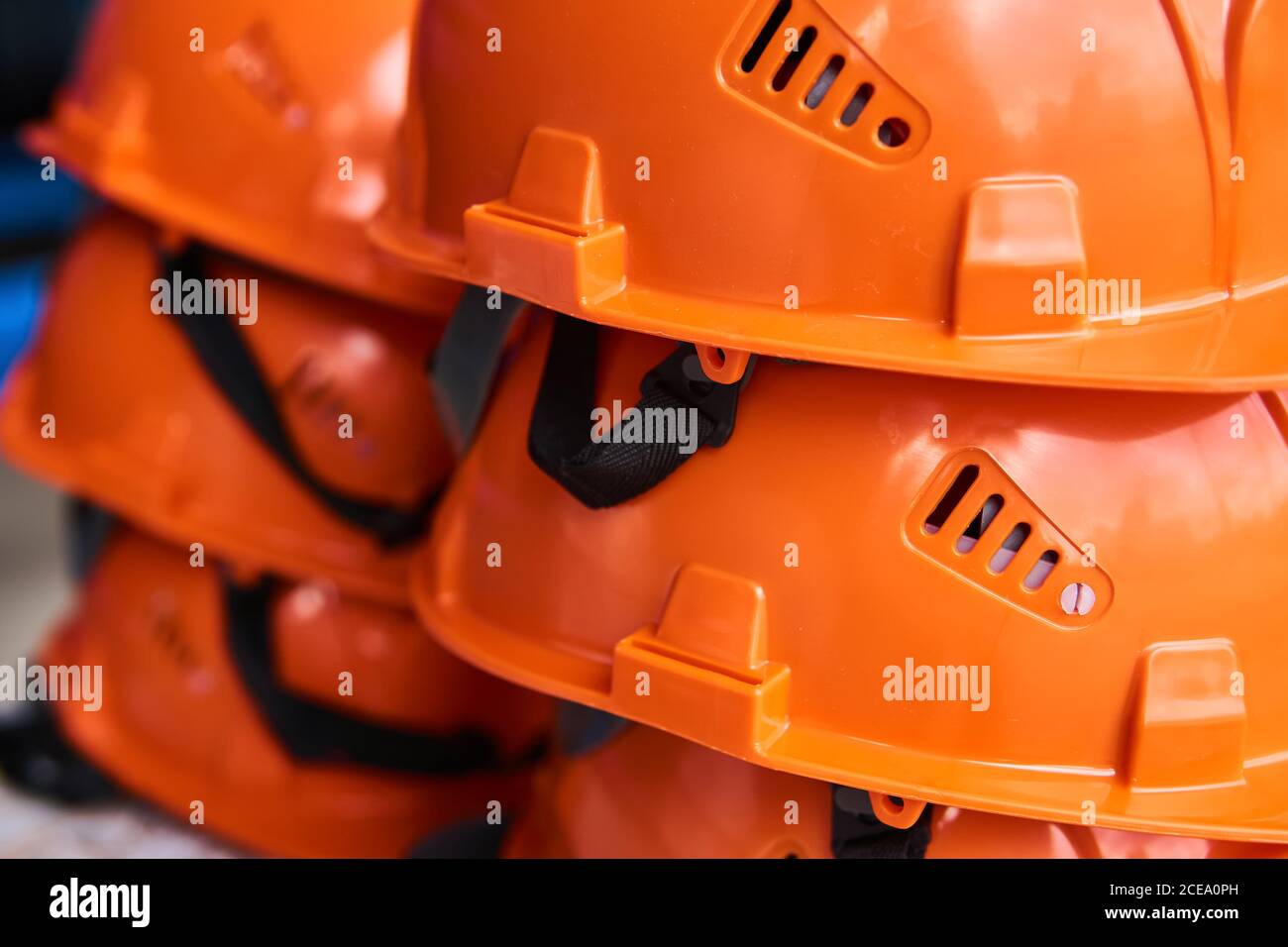 Orange safety hats hi-res stock photography and images - Alamy