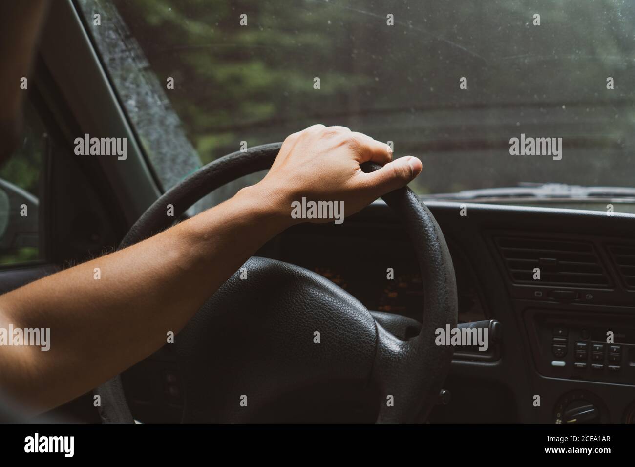 anonymous guy driving modern vehicle along asphalt road in amazing ...