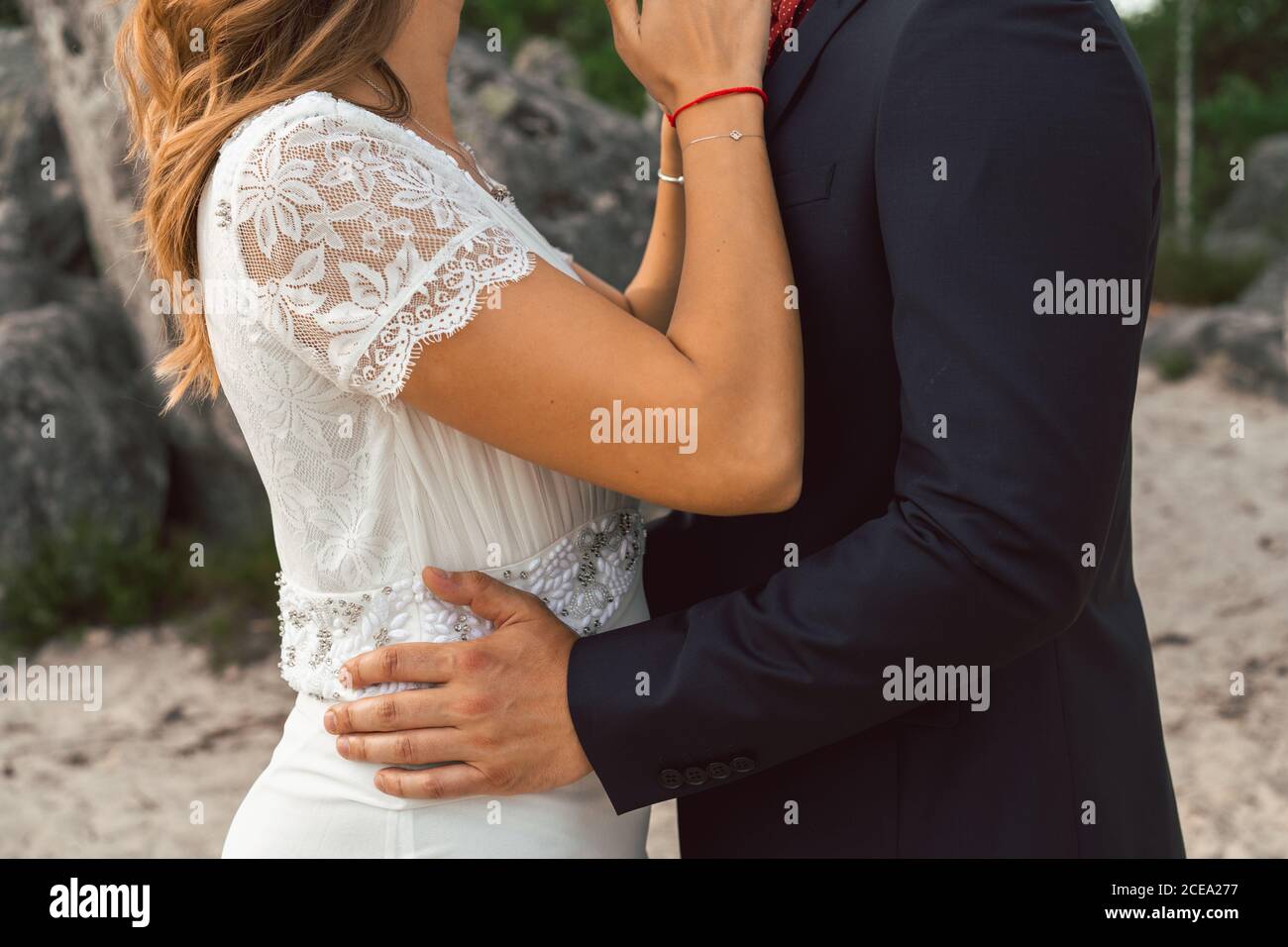 Crop side view of cheerful tender man and Woman touching with noses and ...
