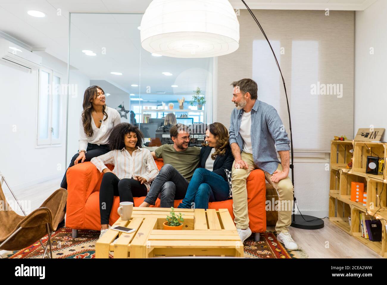 Team business people collaborate holding hi-res stock photography and ...