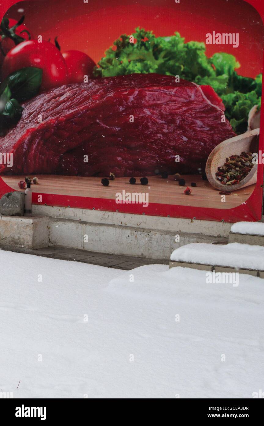 Meat Advertisement on a Supermarket Wall in Snowy Bishkek, Kyrgyzstan ...