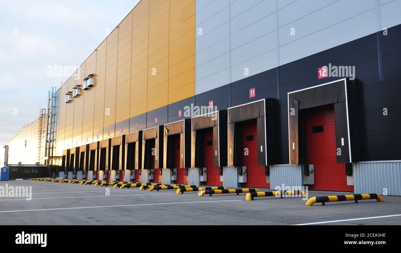 Empty loading bay of a large warehouse. Logistics center Stock Photo ...