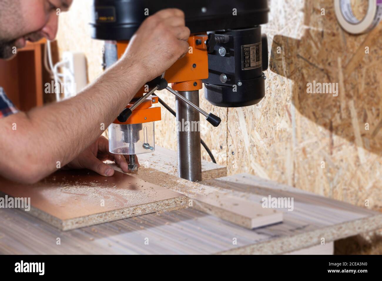 Man work machine drill hi-res stock photography and images - Alamy