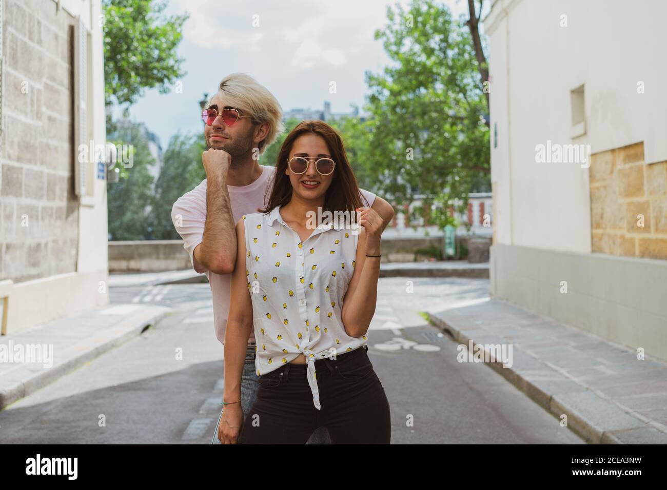 Happy friends on street having hi-res stock photography and images - Alamy