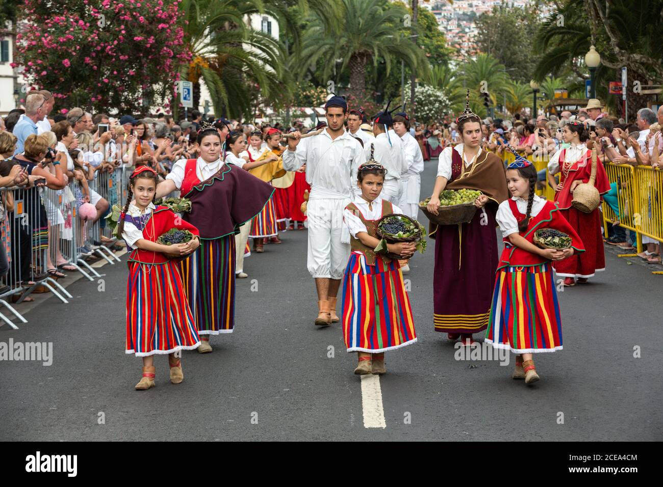 FUNCHAL, PORTUGAL - SEPTEMBER 4, 2016: Group of people in traditional ...