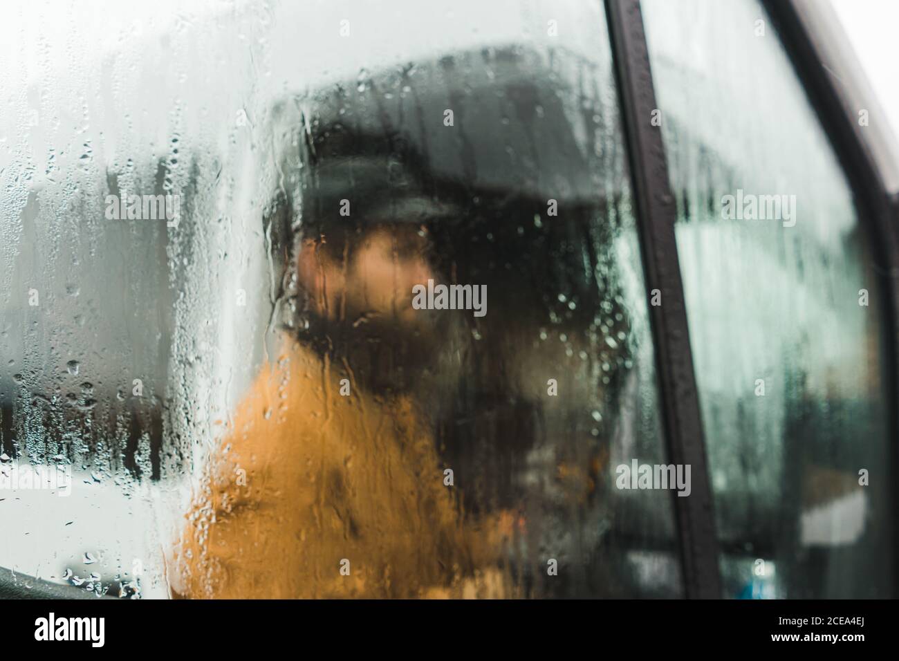 Man standing behind car hi-res stock photography and images - Alamy