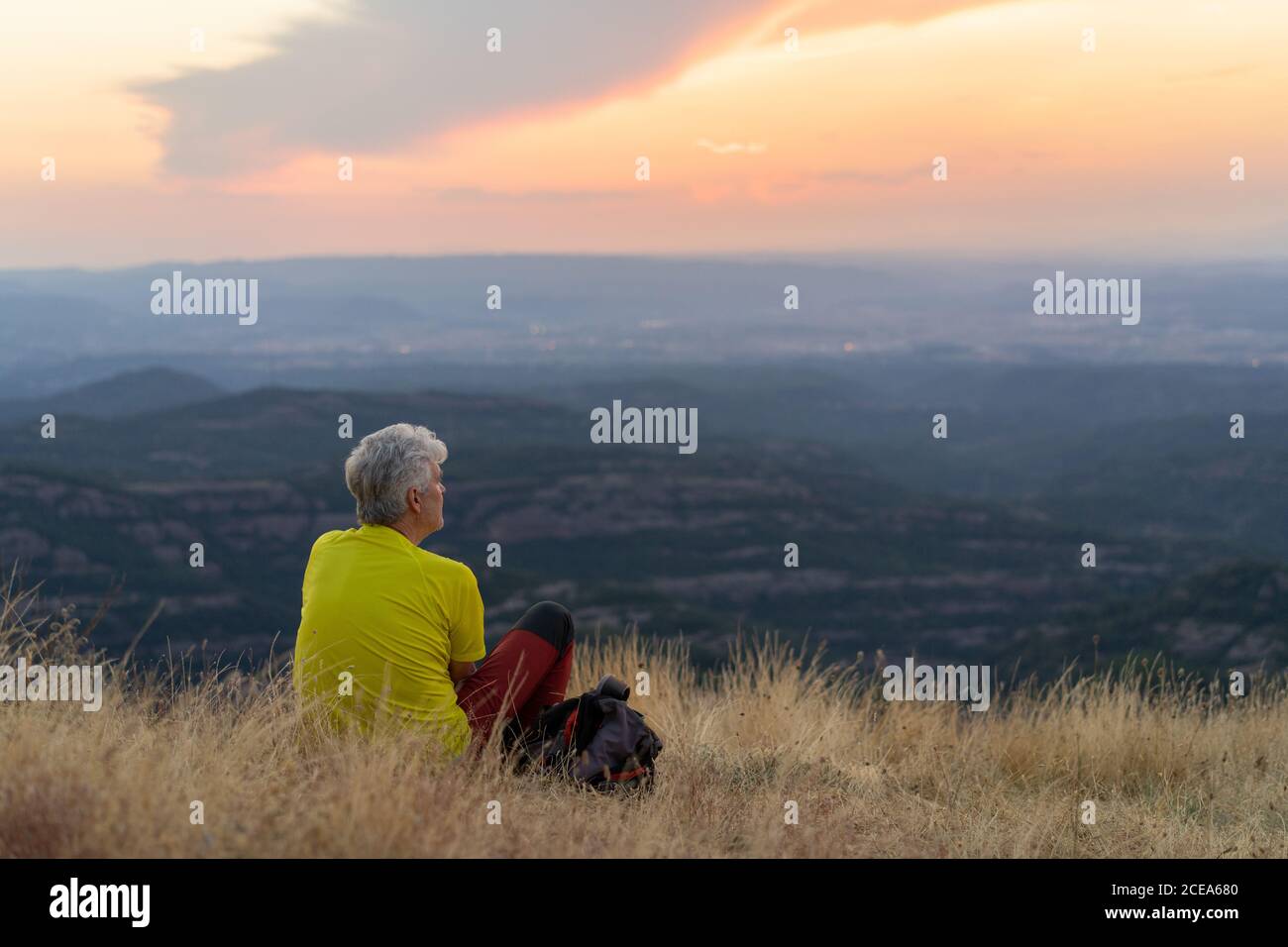Elderly man relaxing in nature Stock Photo - Alamy