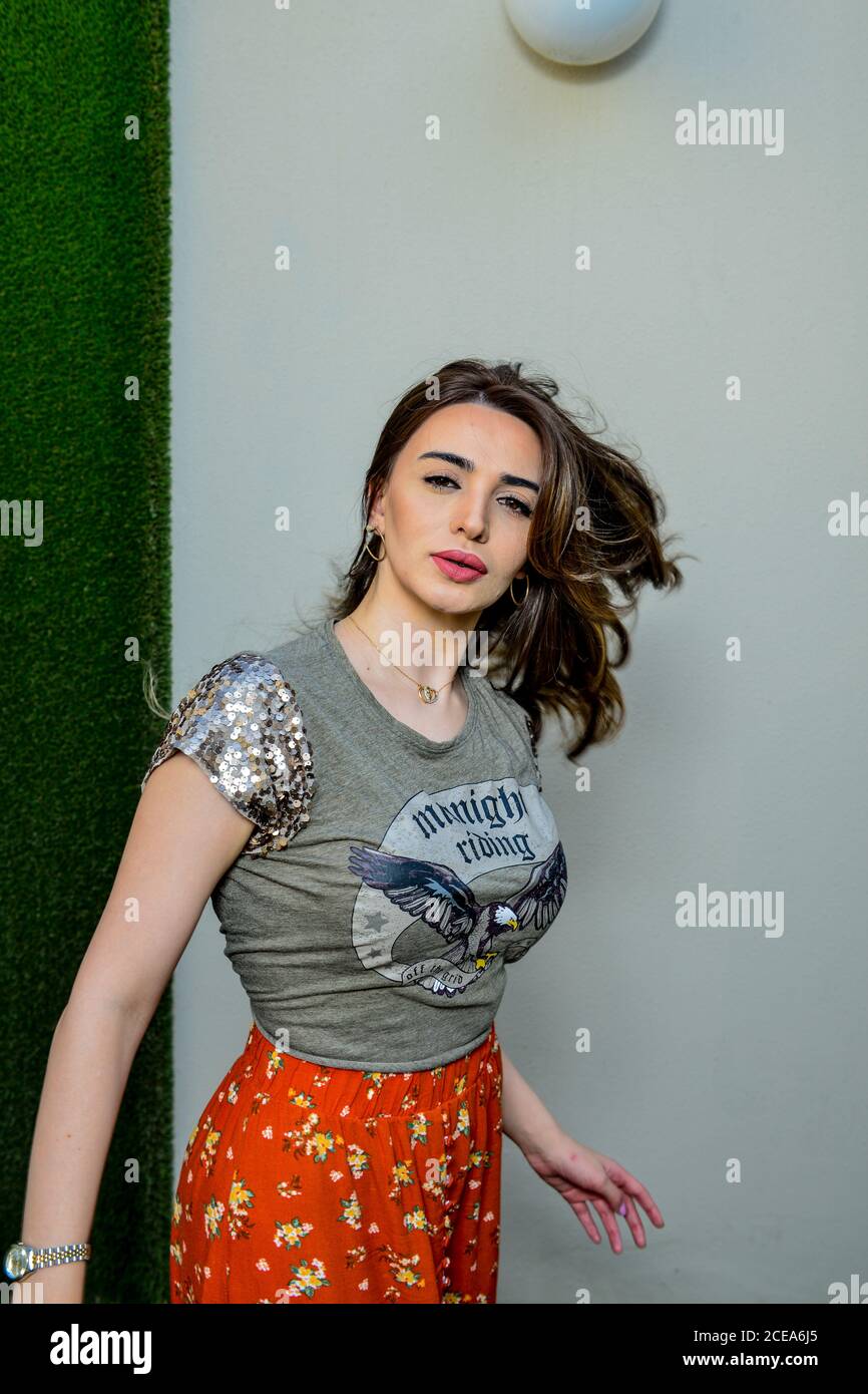 female Arab model after makeup and hair style on white background Stock ...