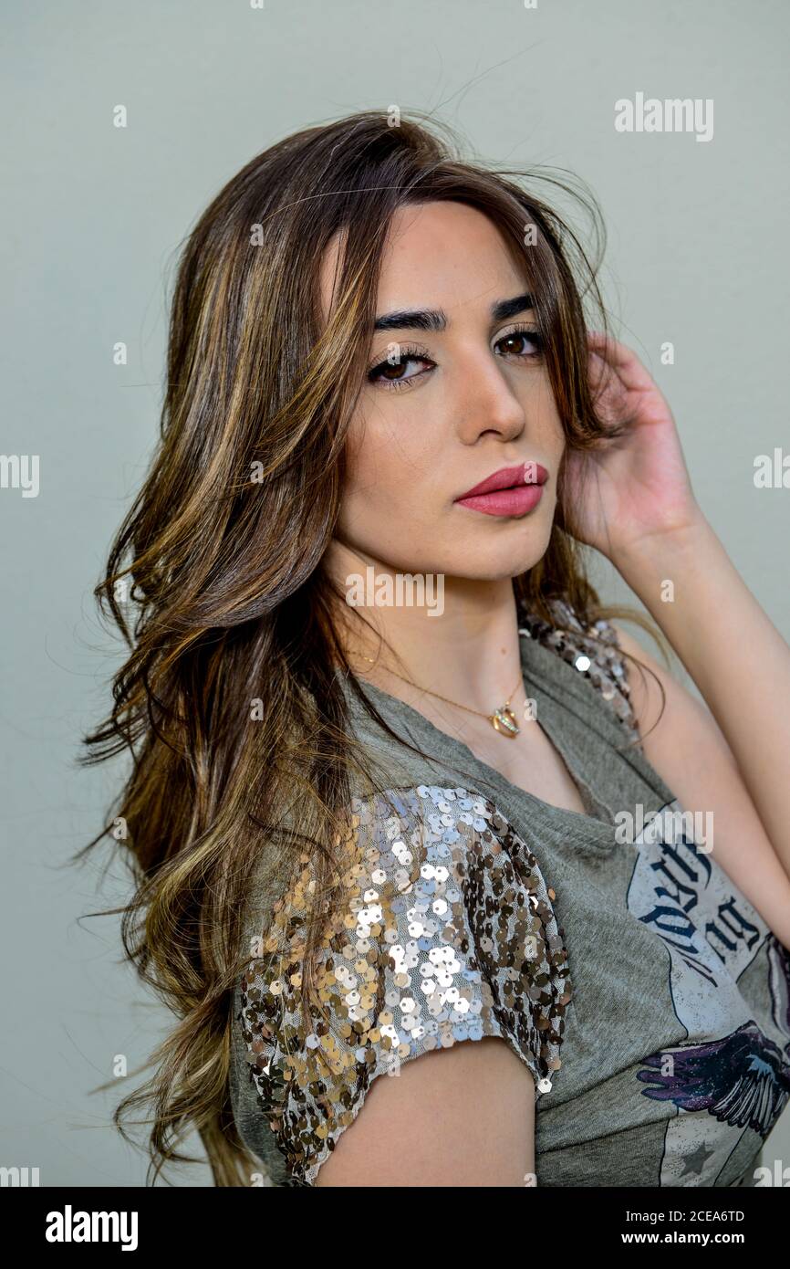 female Arab model after makeup and hair style on white background Stock ...