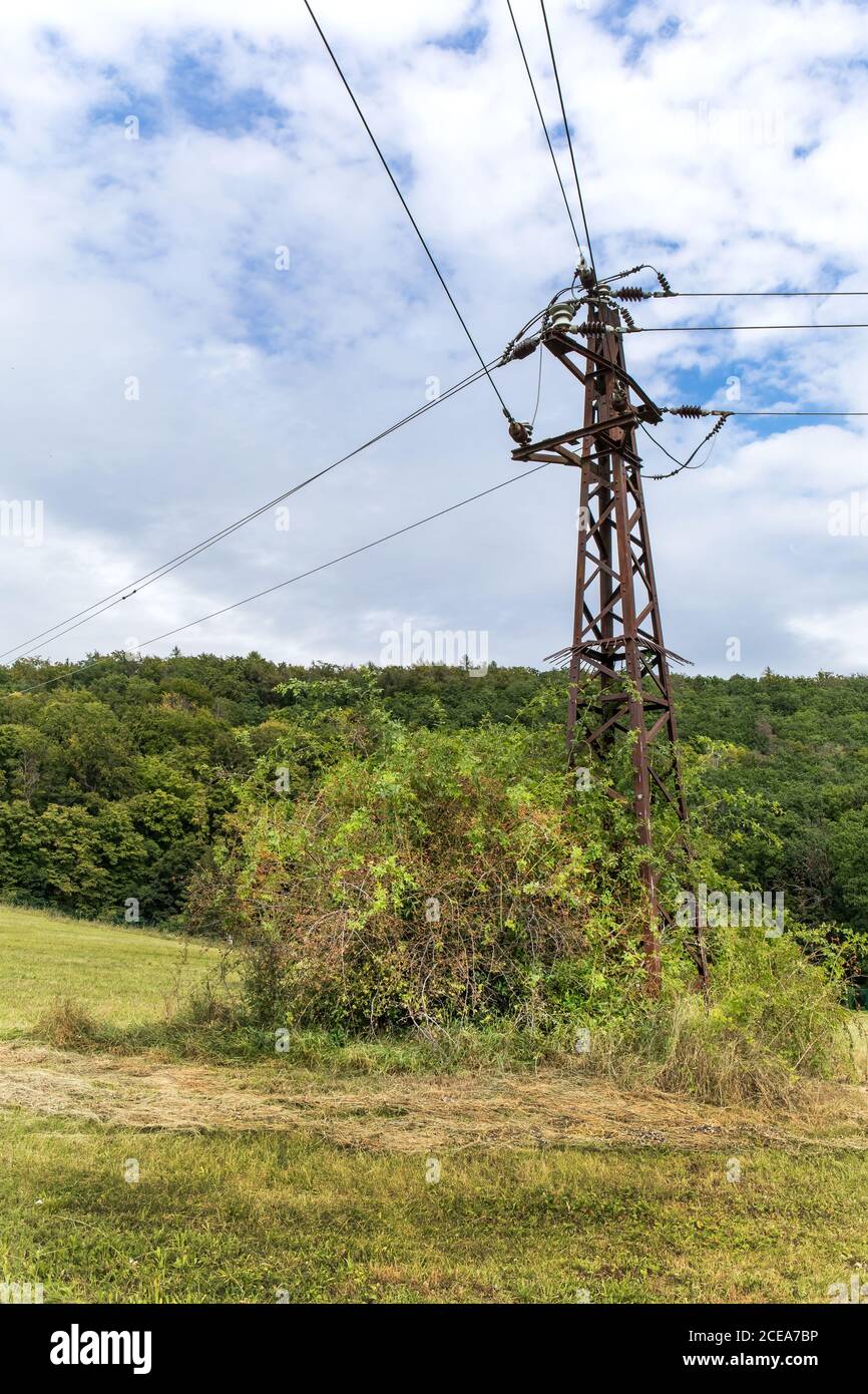 Energy concept. Ecological energy.Old rusty electricity poles and wires ...
