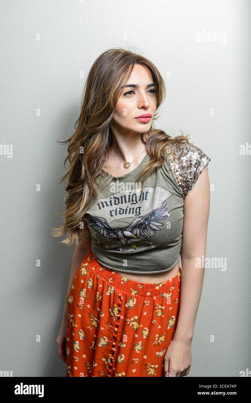 female Arab model after makeup and hair style on white background Stock ...