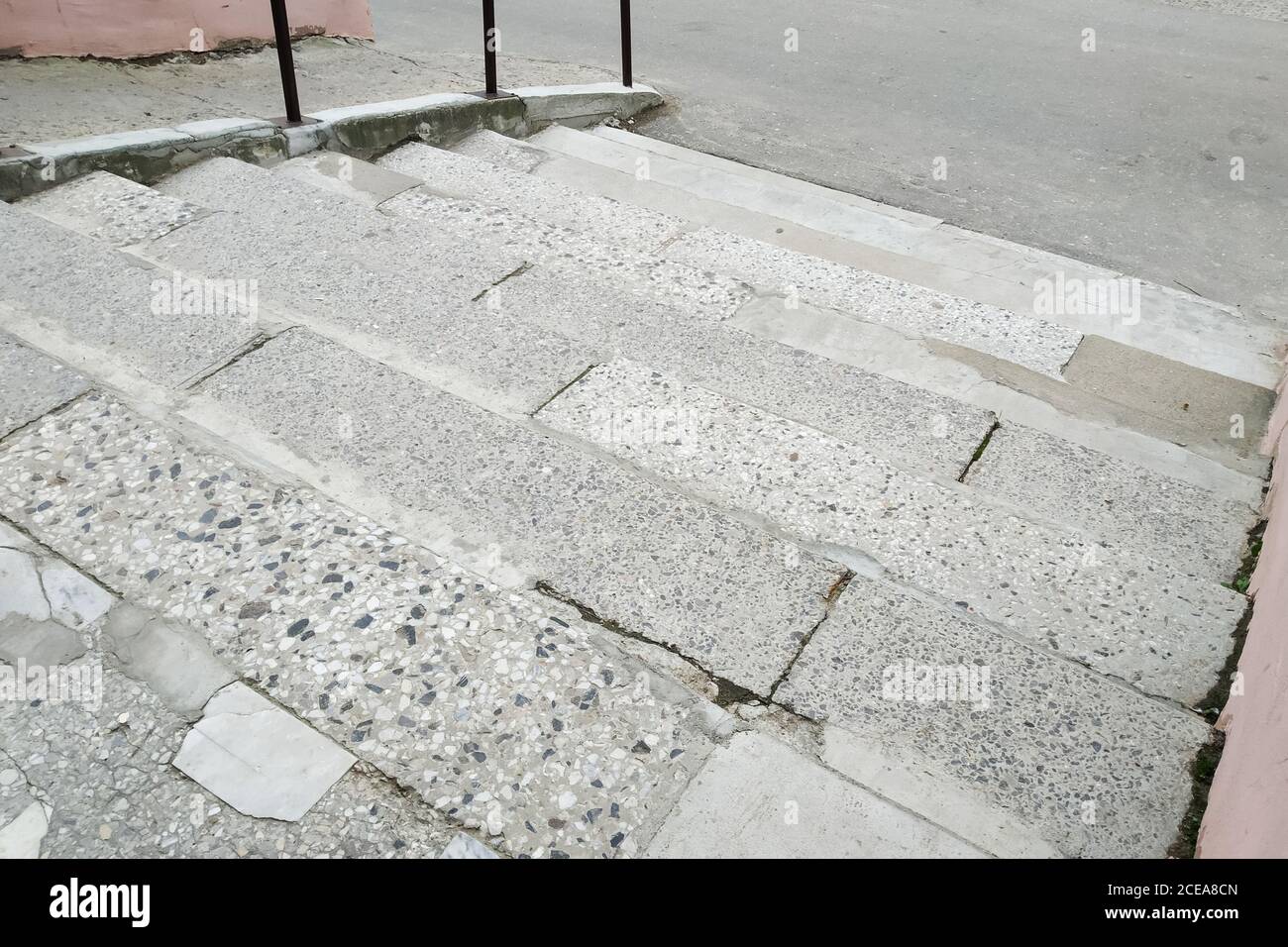Gray tile steps on the sidewalk closeup Stock Photo - Alamy