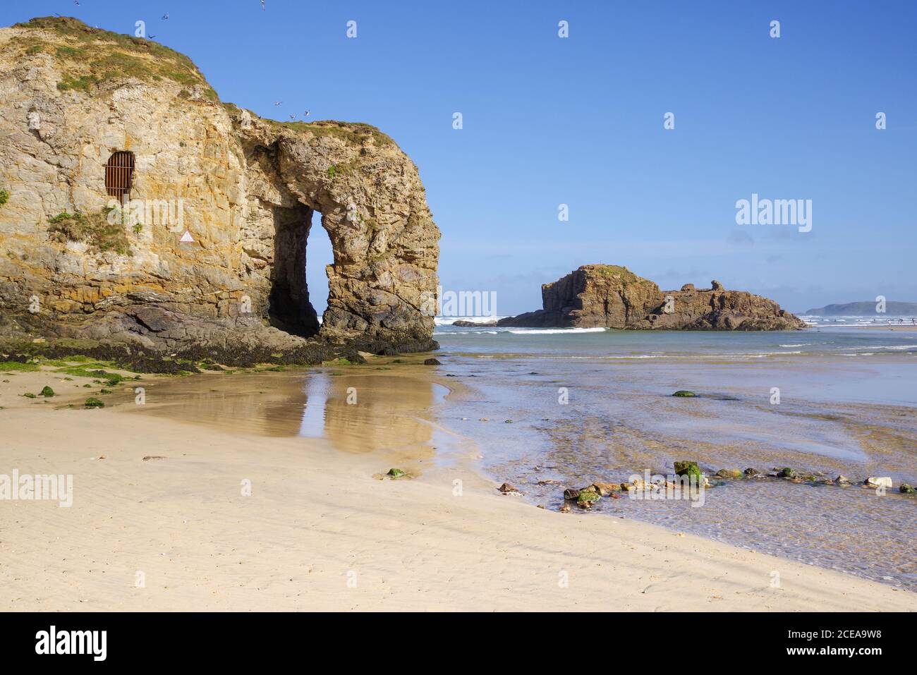 Spectacular Perrantport Arch Rock - a hole in the cliff caused by ...