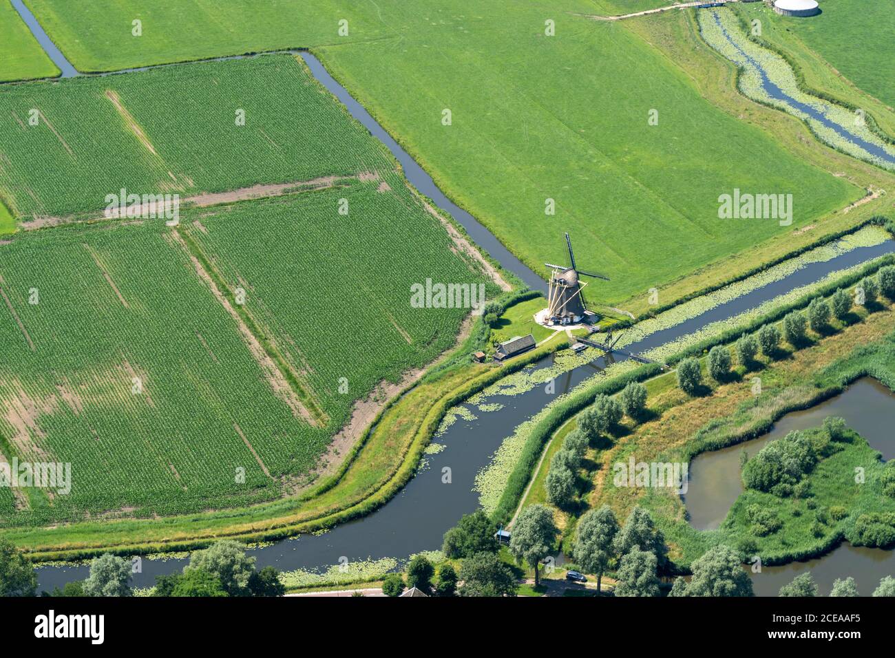 The Netherlands from above with green fields, rivers and houses on the ...