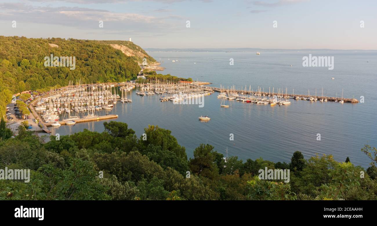 Panoramic view of Sistiana bay, on the coast near Trieste, Italy, in a ...