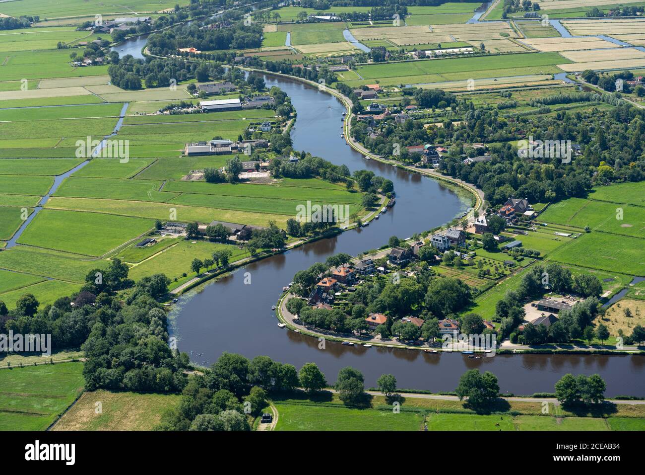 The Netherlands from above with green fields, rivers and houses on the ...