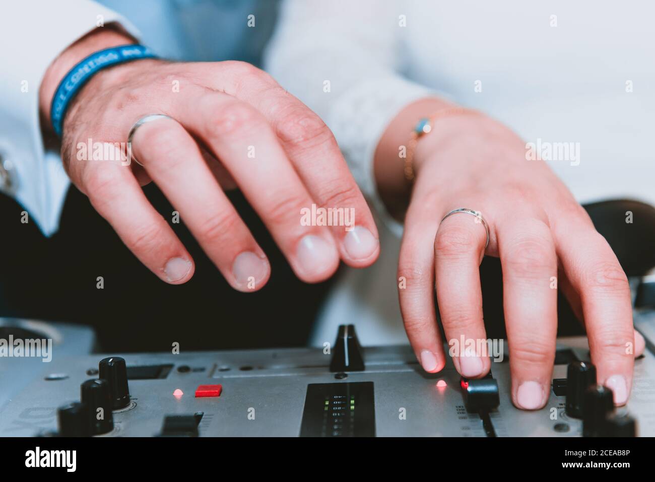 Crop man using music equalizer Stock Photo - Alamy