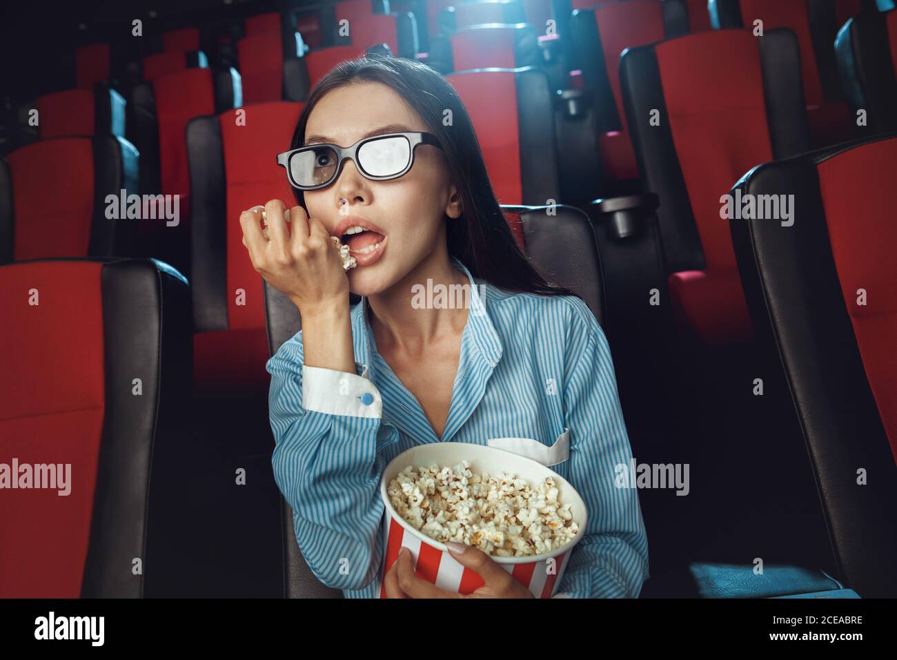Young person going out to the cinema Stock Photo - Alamy