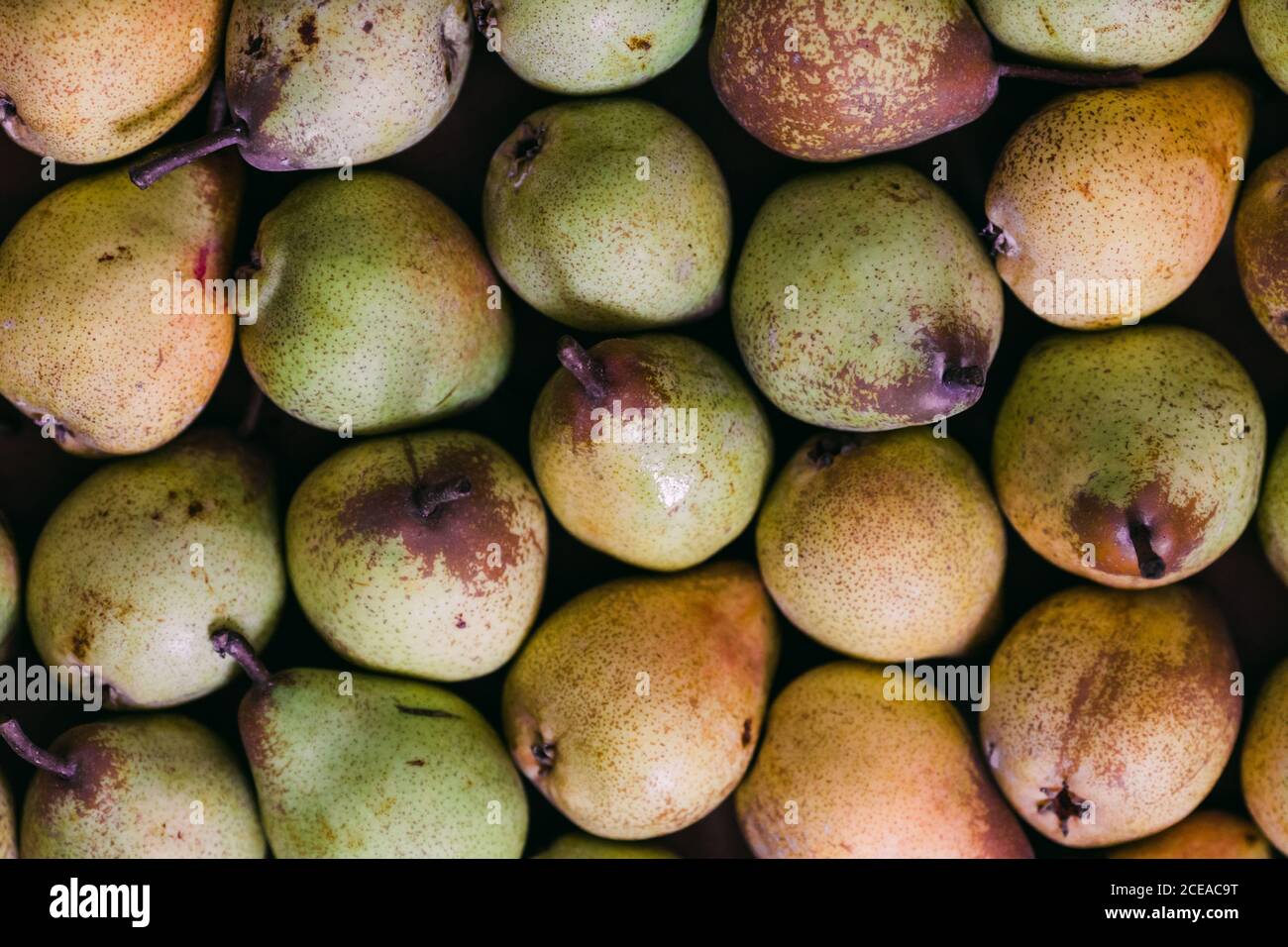 Top view of composed ripe shiny pears in layer Stock Photo - Alamy