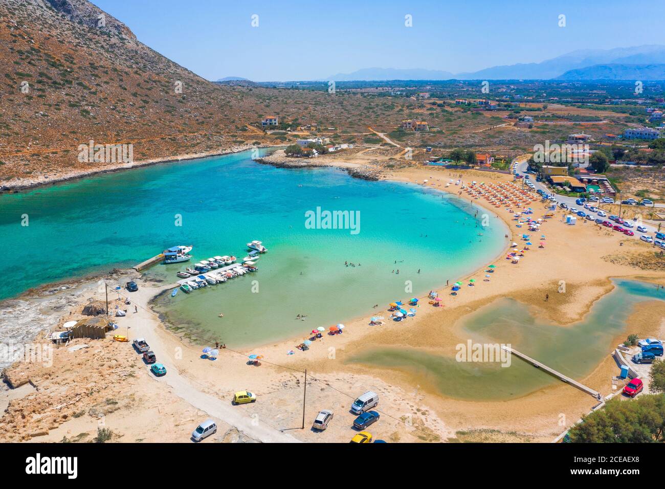 Amazing sandy beach of Stavros in a scenic lagoon, Chania, Crete ...