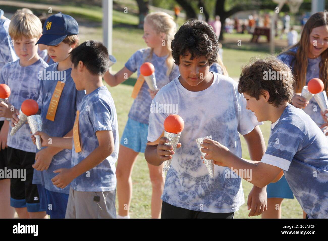 Austin, TX May 9, 2008: Hispanic fifth-graders play a ball-and-cone ...