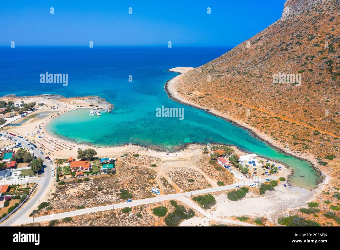Amazing sandy beach of Stavros in a scenic lagoon, Chania, Crete ...