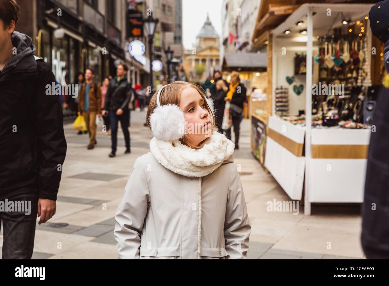 A cute little girl on christmas market in Budapest, Hungary Stock Photo ...