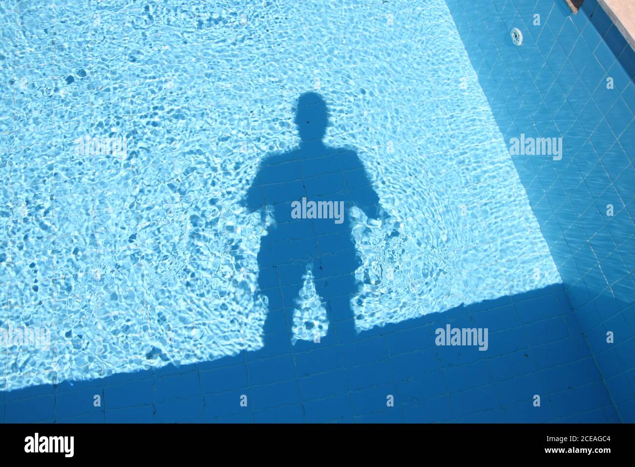 Swimming pool shadow person hi-res stock photography and images - Alamy