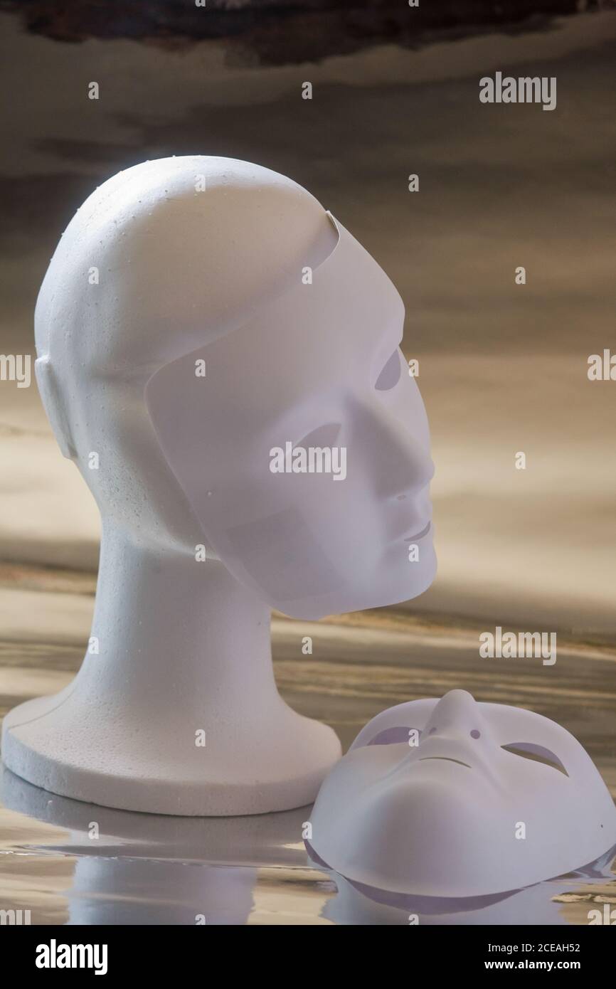 White mannequin head and masks Stock Photo - Alamy