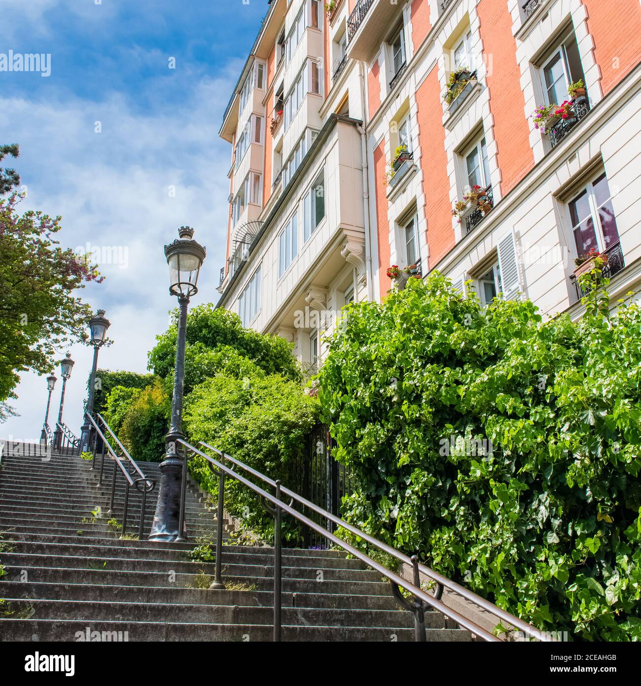 Paris, romantic staircase in Montmartre, typical buildings and floor ...