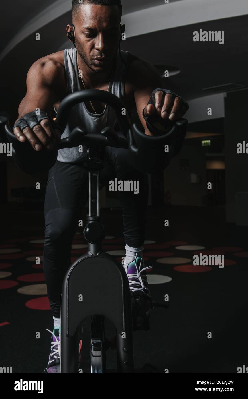Man on exercise bike in gym hi-res stock photography and images - Alamy