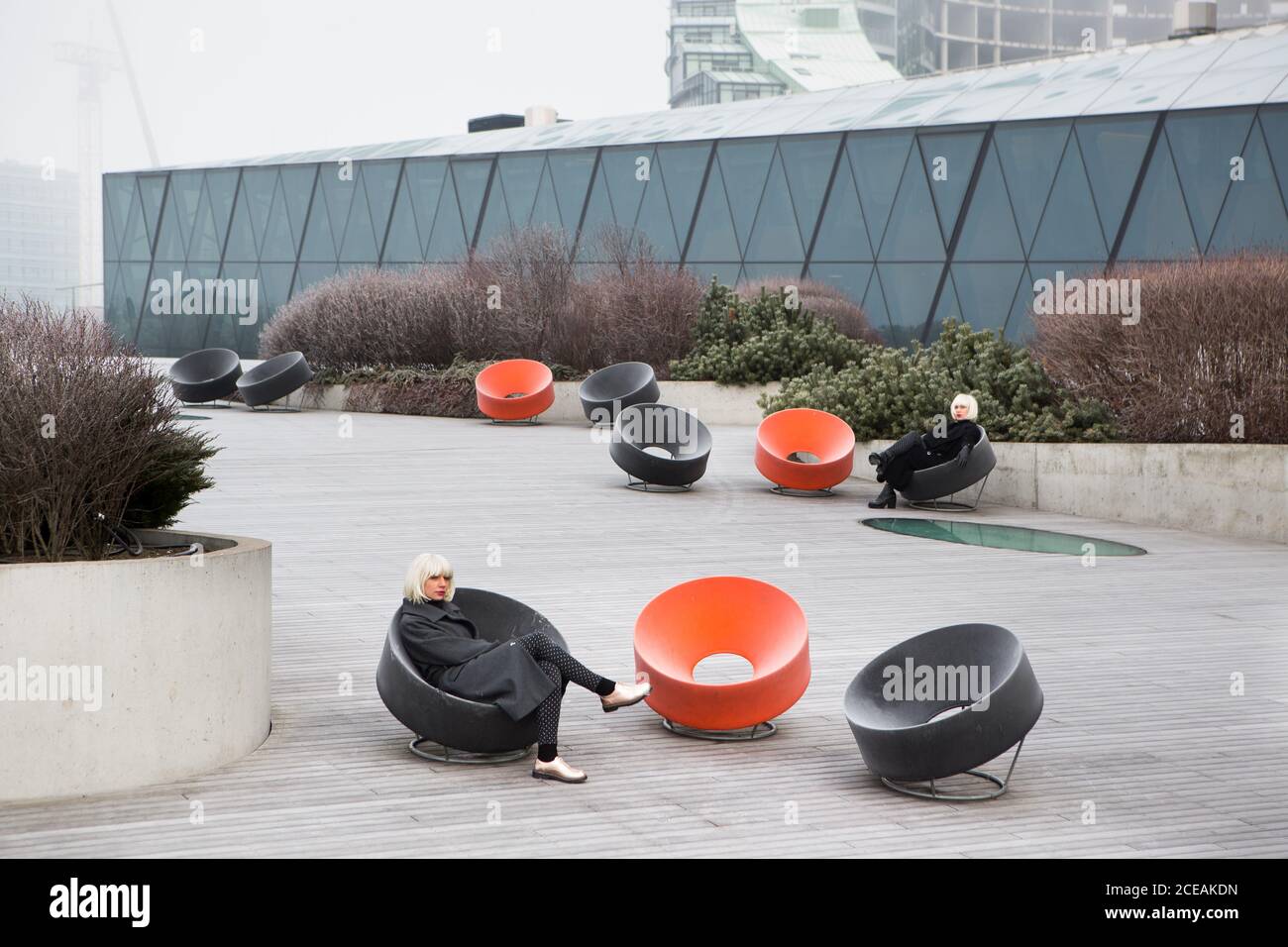 Sitting same chair hi-res stock photography and images - Alamy