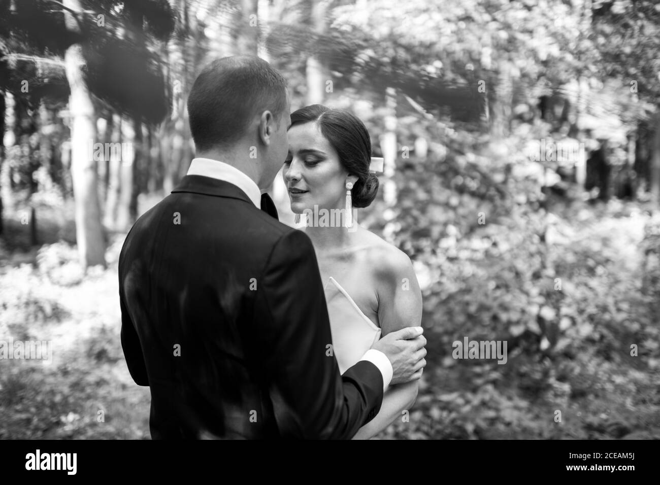 Couple together looking other Black and White Stock Photos & Images - Alamy
