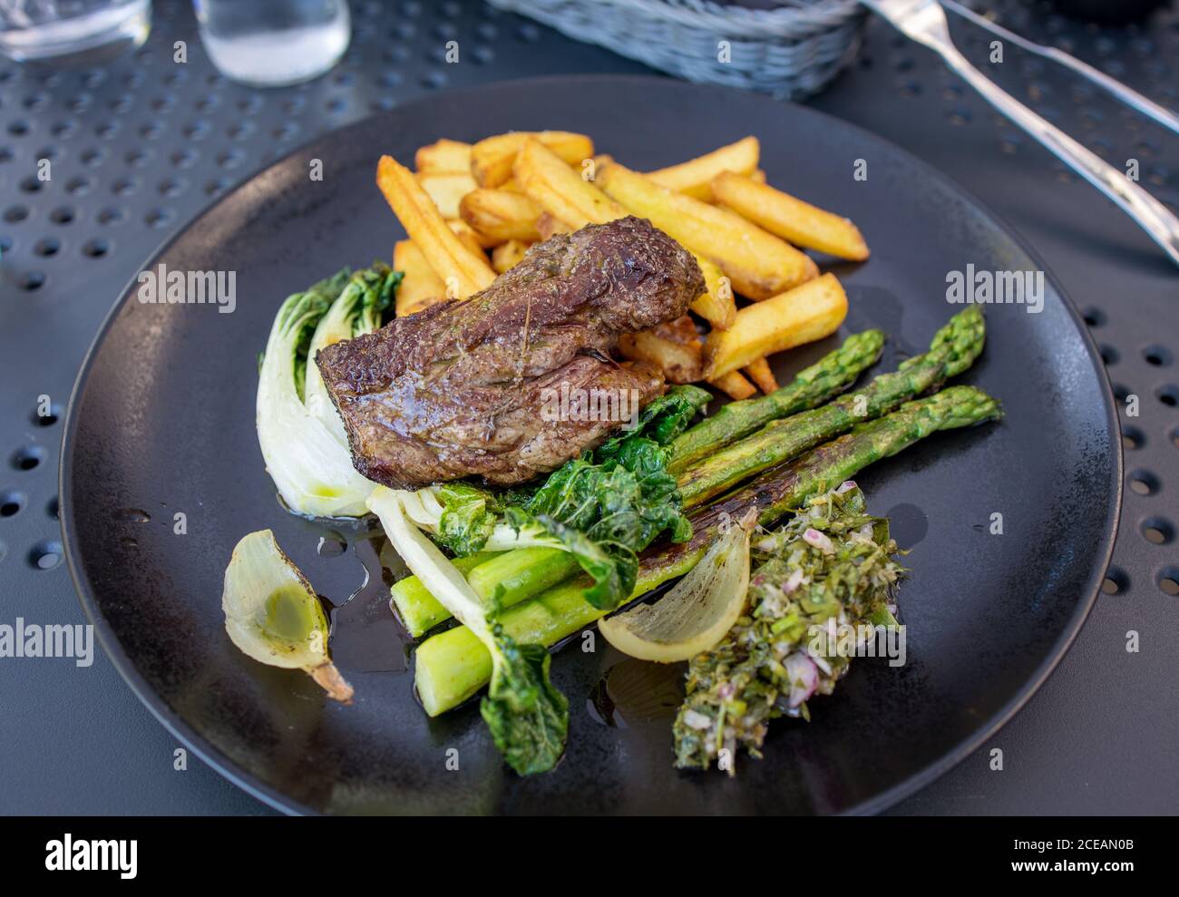 portion of beef fillet steak with vegetables on restaurant table Stock ...