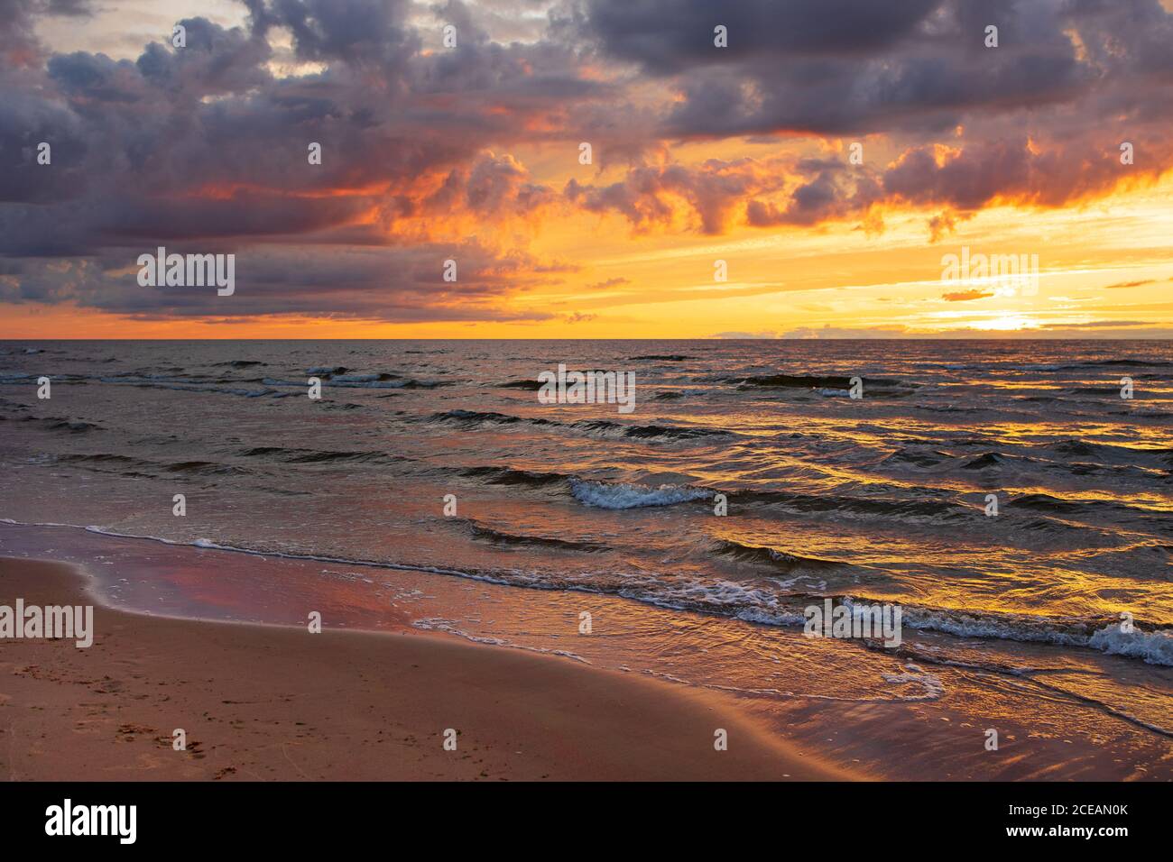 colorful sunset over the sea and beautiful cloudscape Stock Photo - Alamy