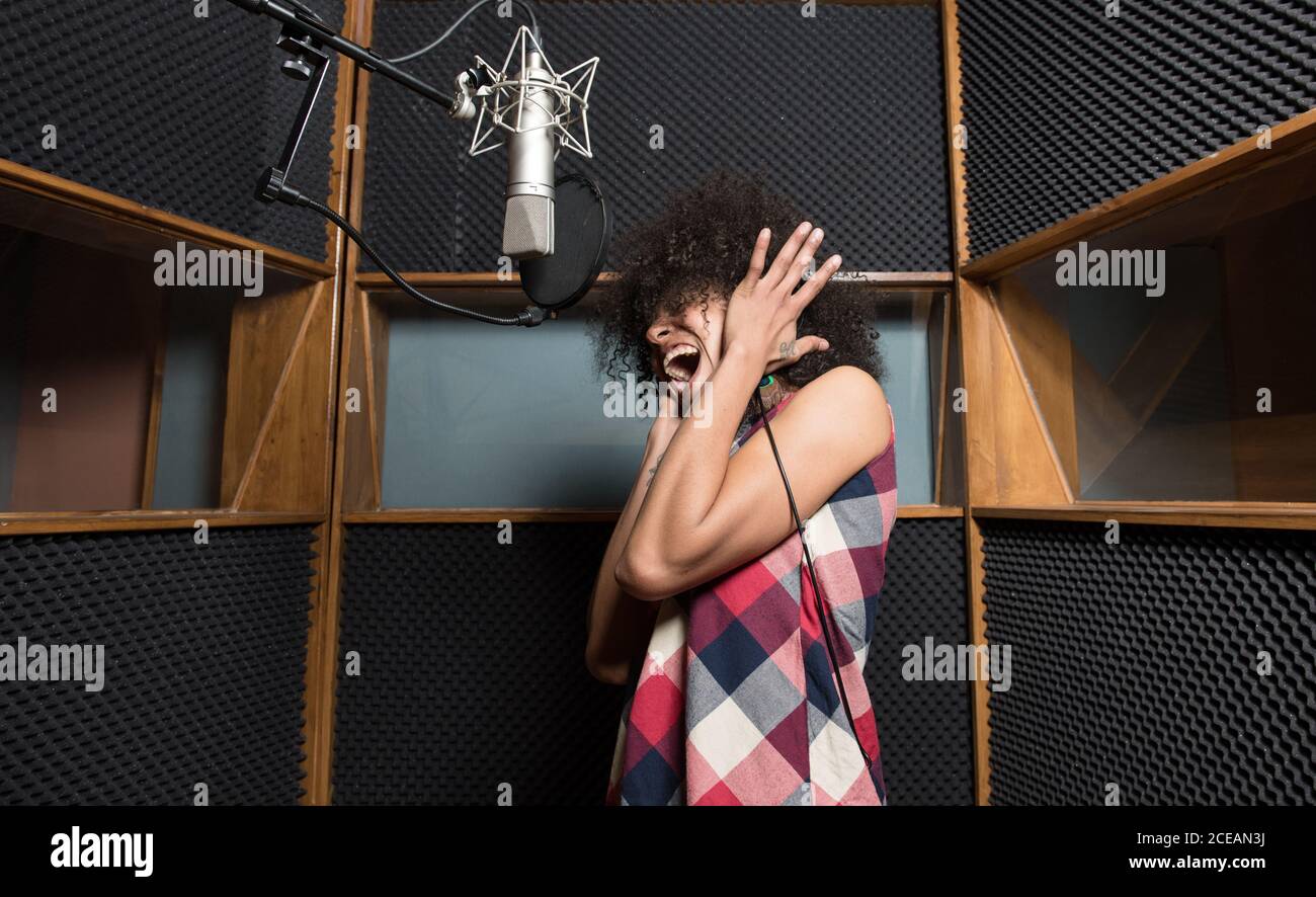 Singing in studio hi-res stock photography and images - Alamy