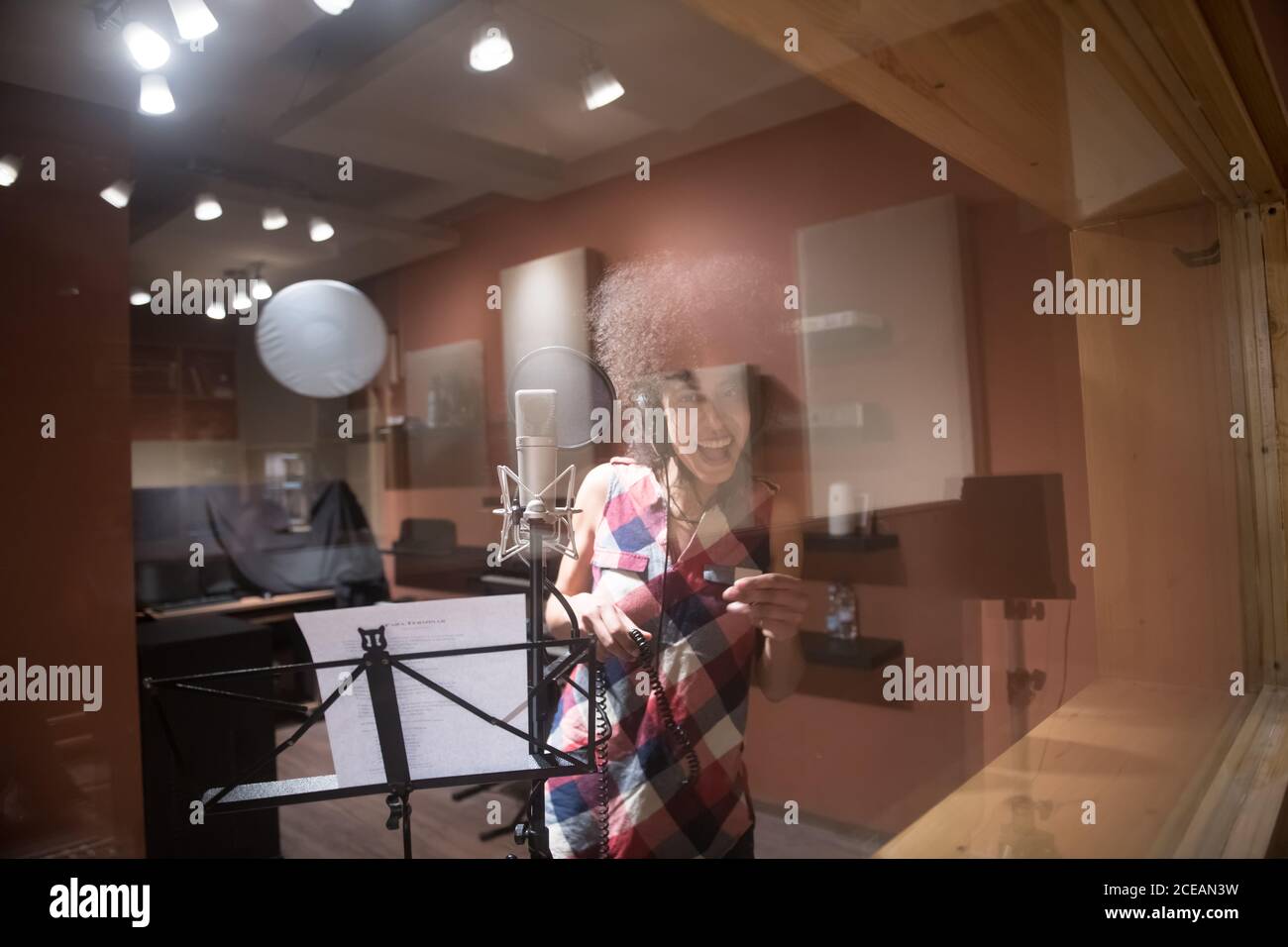 Woman singing in recording studio hi-res stock photography and images ...