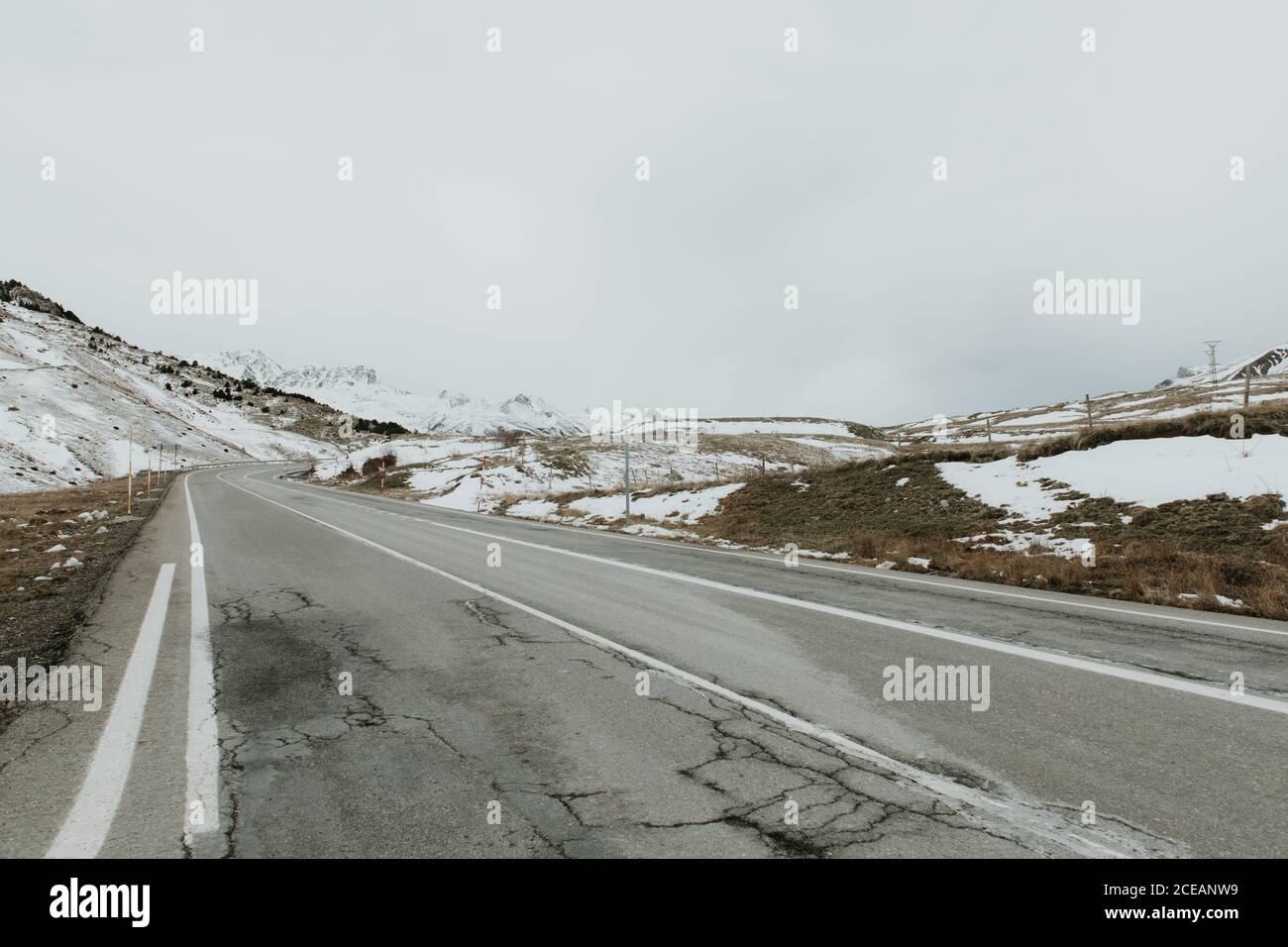 Snowy route running between mountains in Pyrenees Stock Photo - Alamy