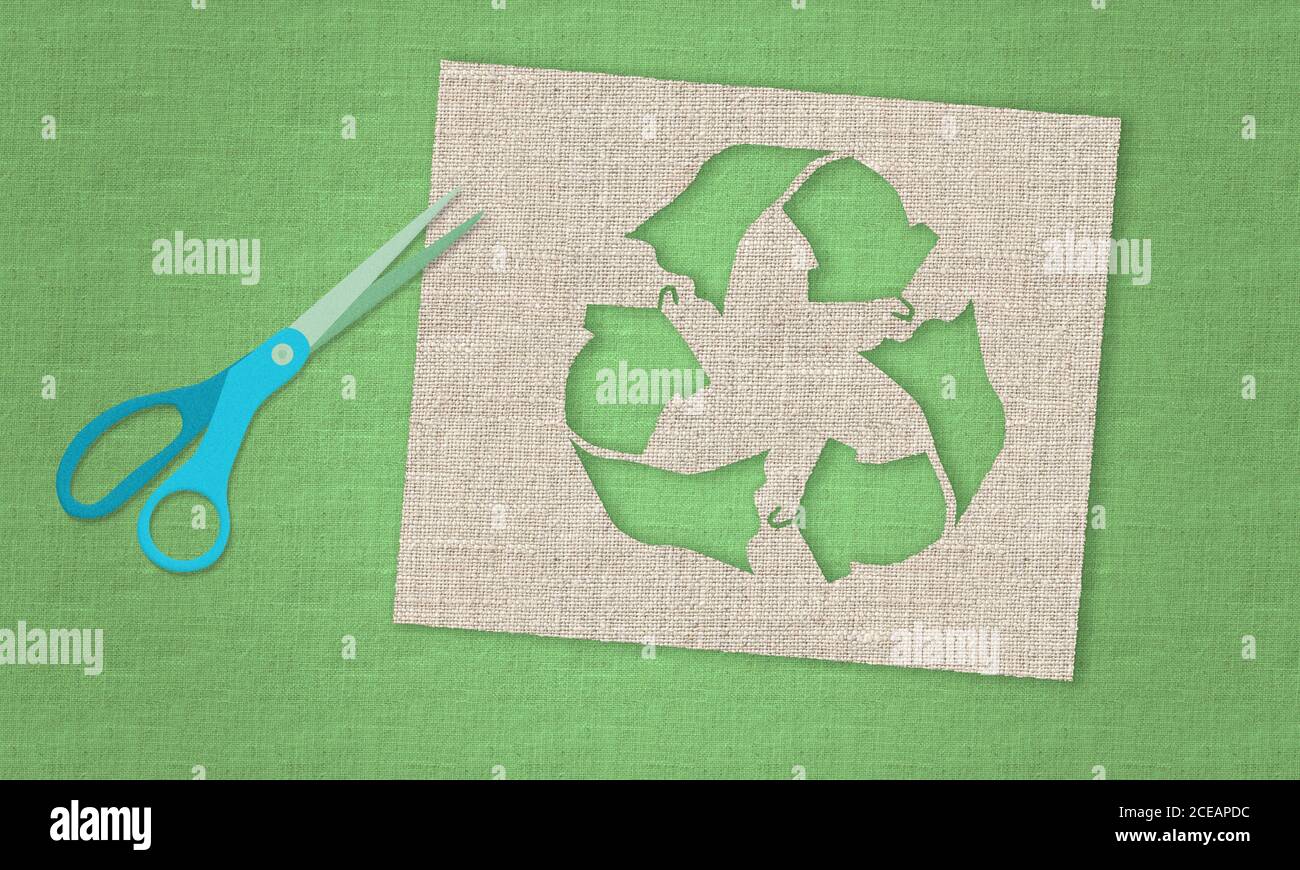 recycle clothes symbol recycle sign cut from reuse fabric on a textile ...