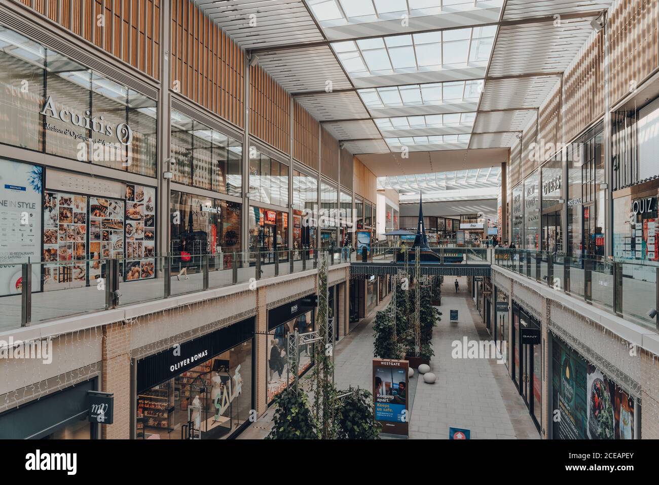 Oxford, UK - August 04, 2020: Few people walking inside The Westgate ...