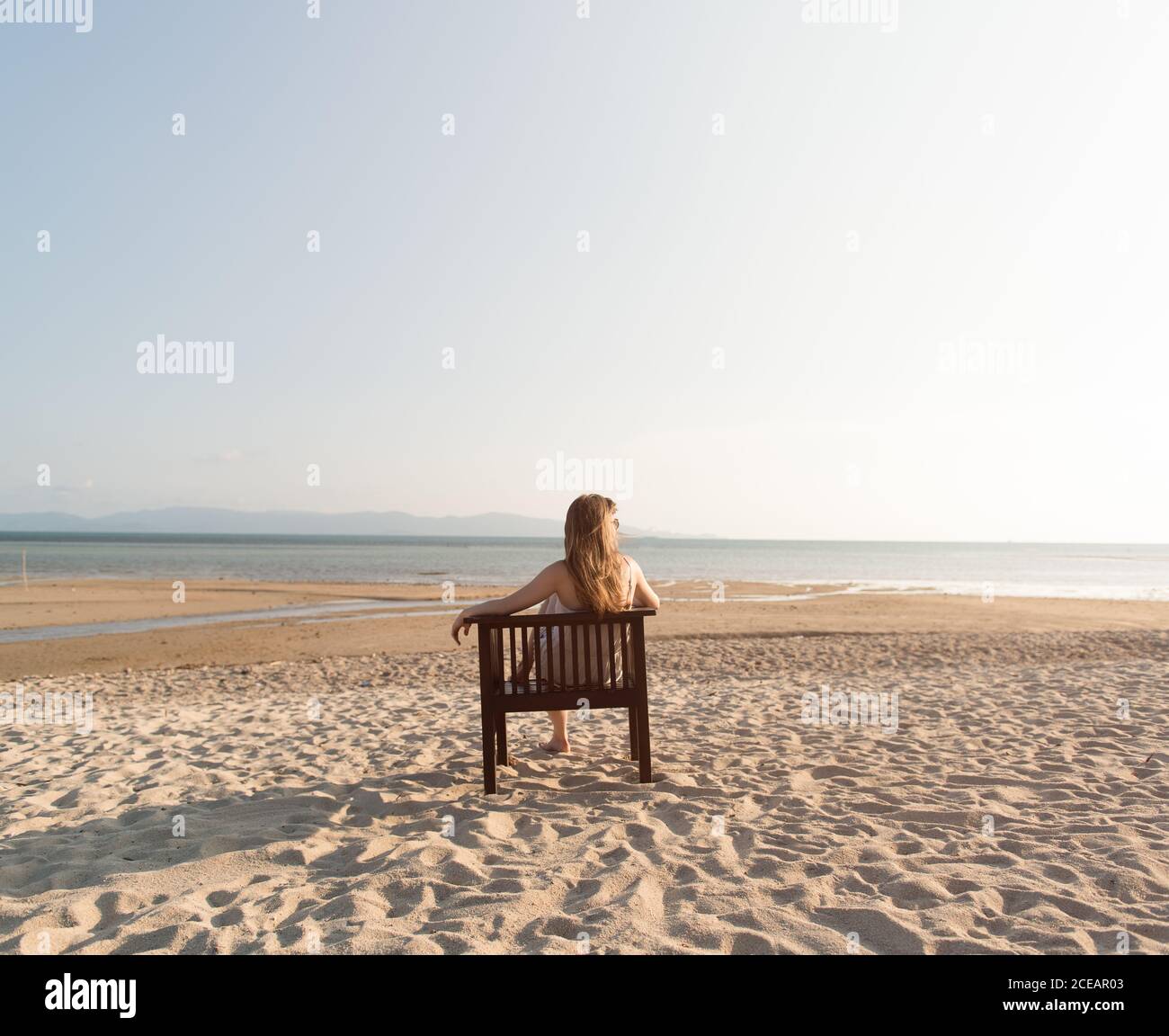 Woman beach chair back hi-res stock photography and images - Alamy