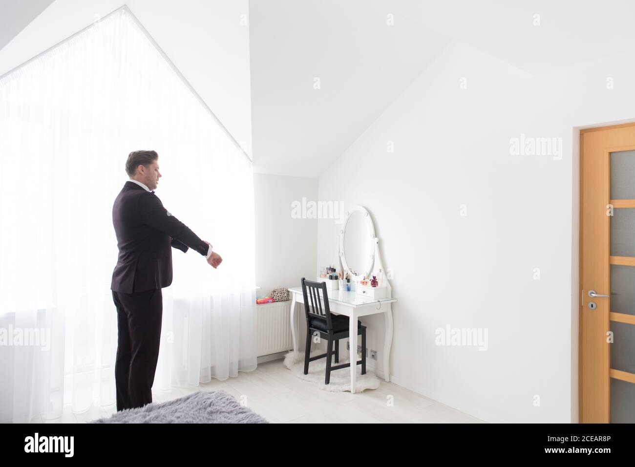Man in wedding suit at table hi-res stock photography and images - Alamy