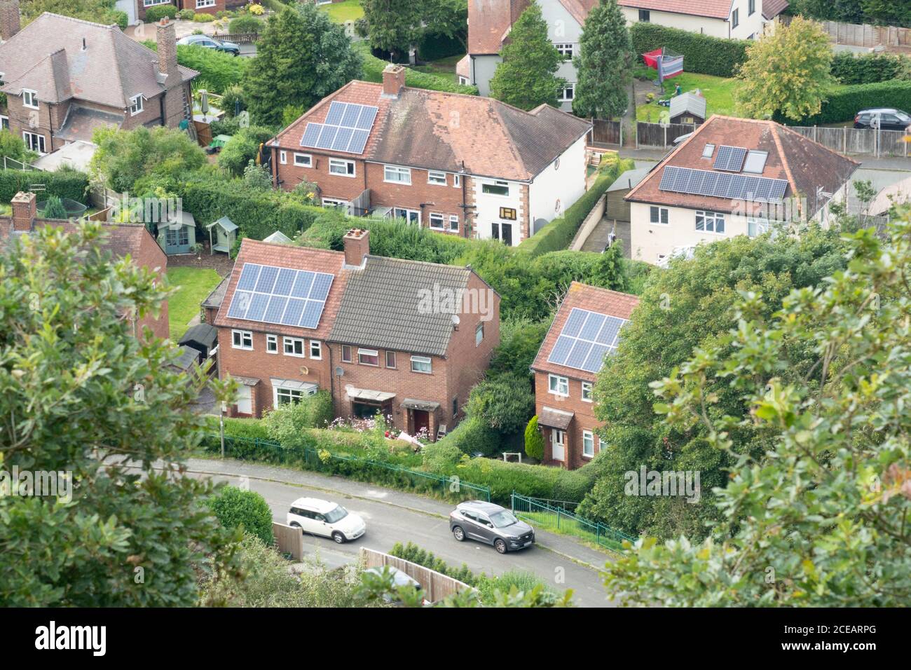 Houses with solar panels on roof, renewable energy, green, property ...