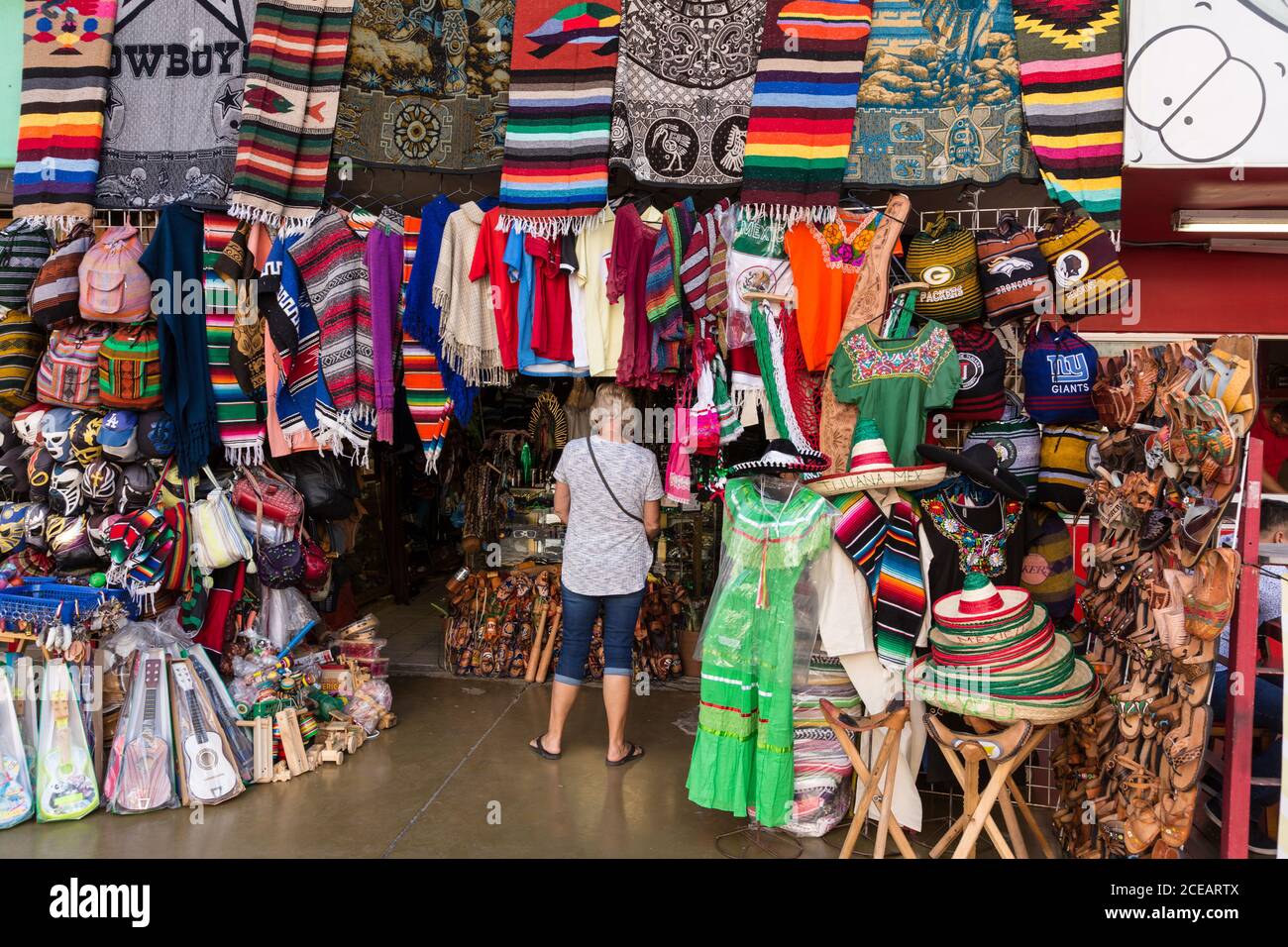 A tourist shops for souvenirs in a a shop in Tijuana, Mexico Stock ...